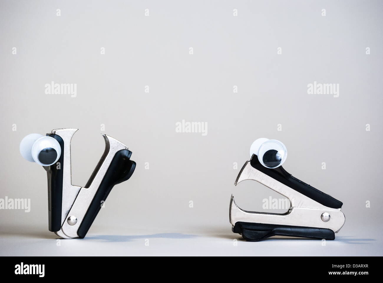 Photograph of staple removers with oogly eyes on a white background ...