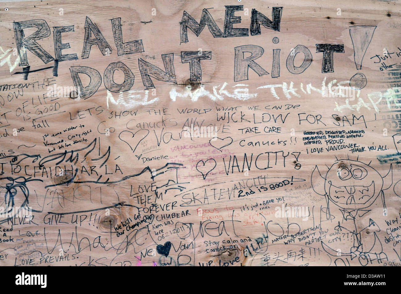 plywood hoarding boarding sign signage public graffiti message riots ...