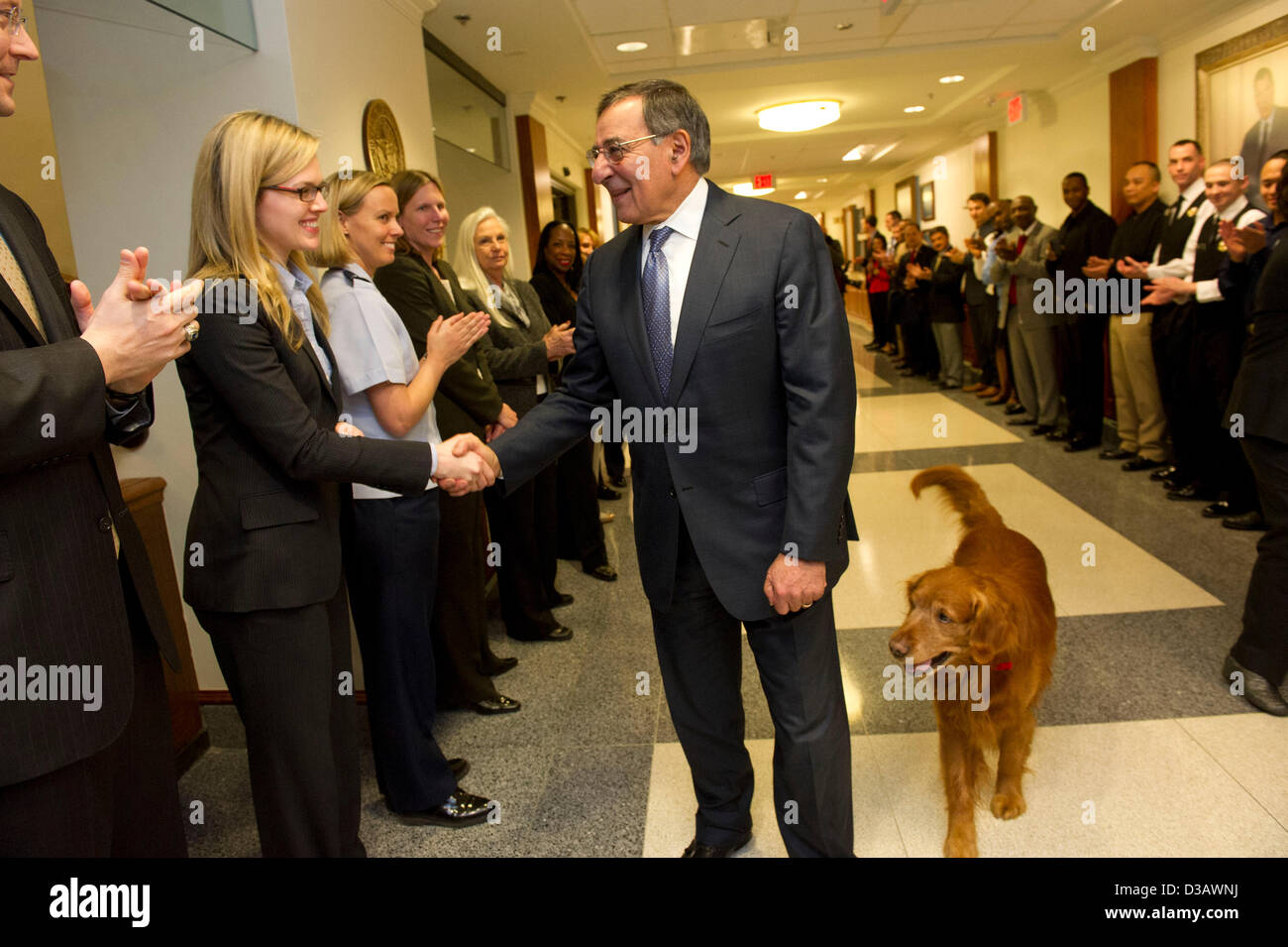 US Secretary of Defense and his wife Sylvia Panetta and dog Bravo exit ...