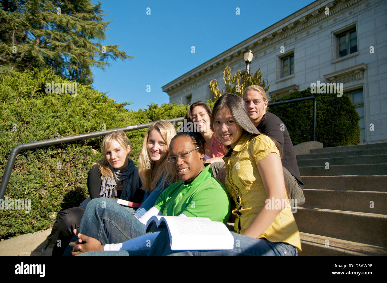 Group of multicultural student group outdoor studying Stock Photo - Alamy