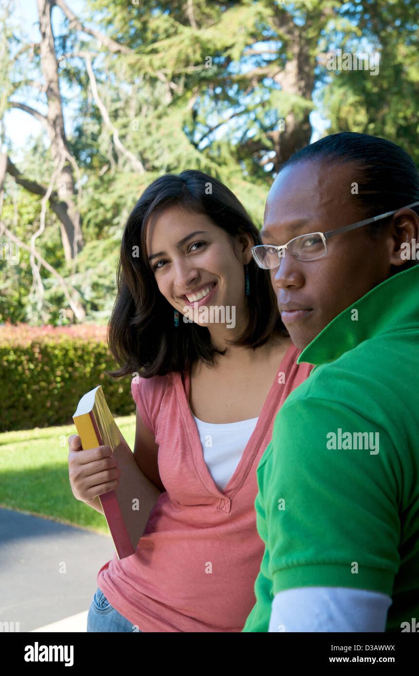 Multicultural students outdoor on campus Stock Photo - Alamy
