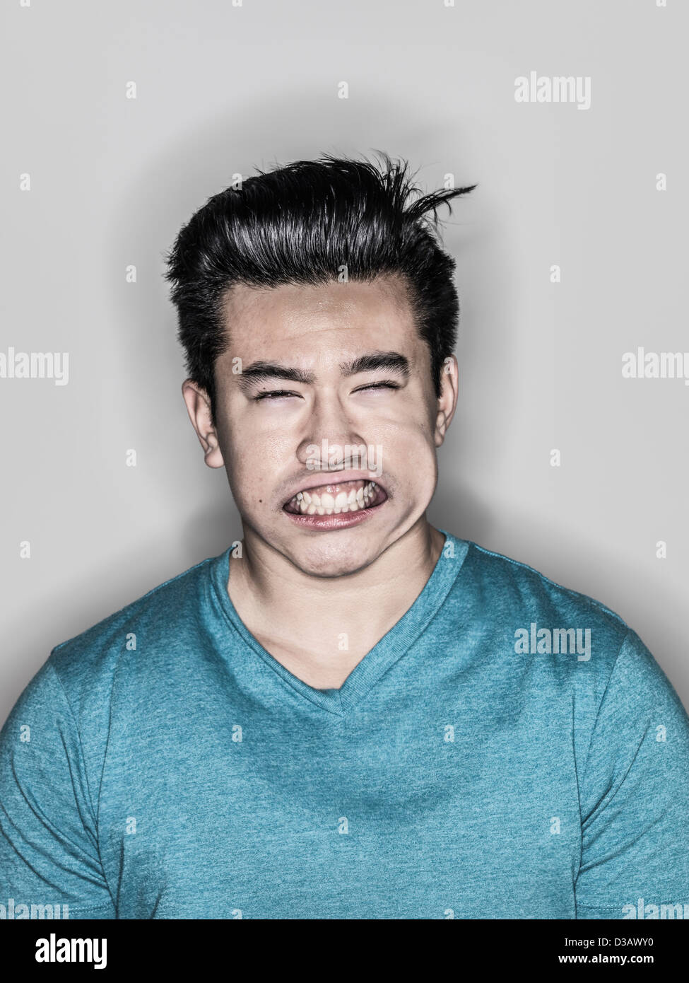 Man making face in wind Stock Photo - Alamy