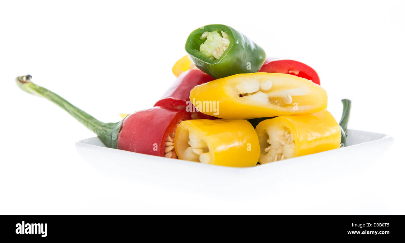 Chilli pieces isolated on white background Stock Photo - Alamy