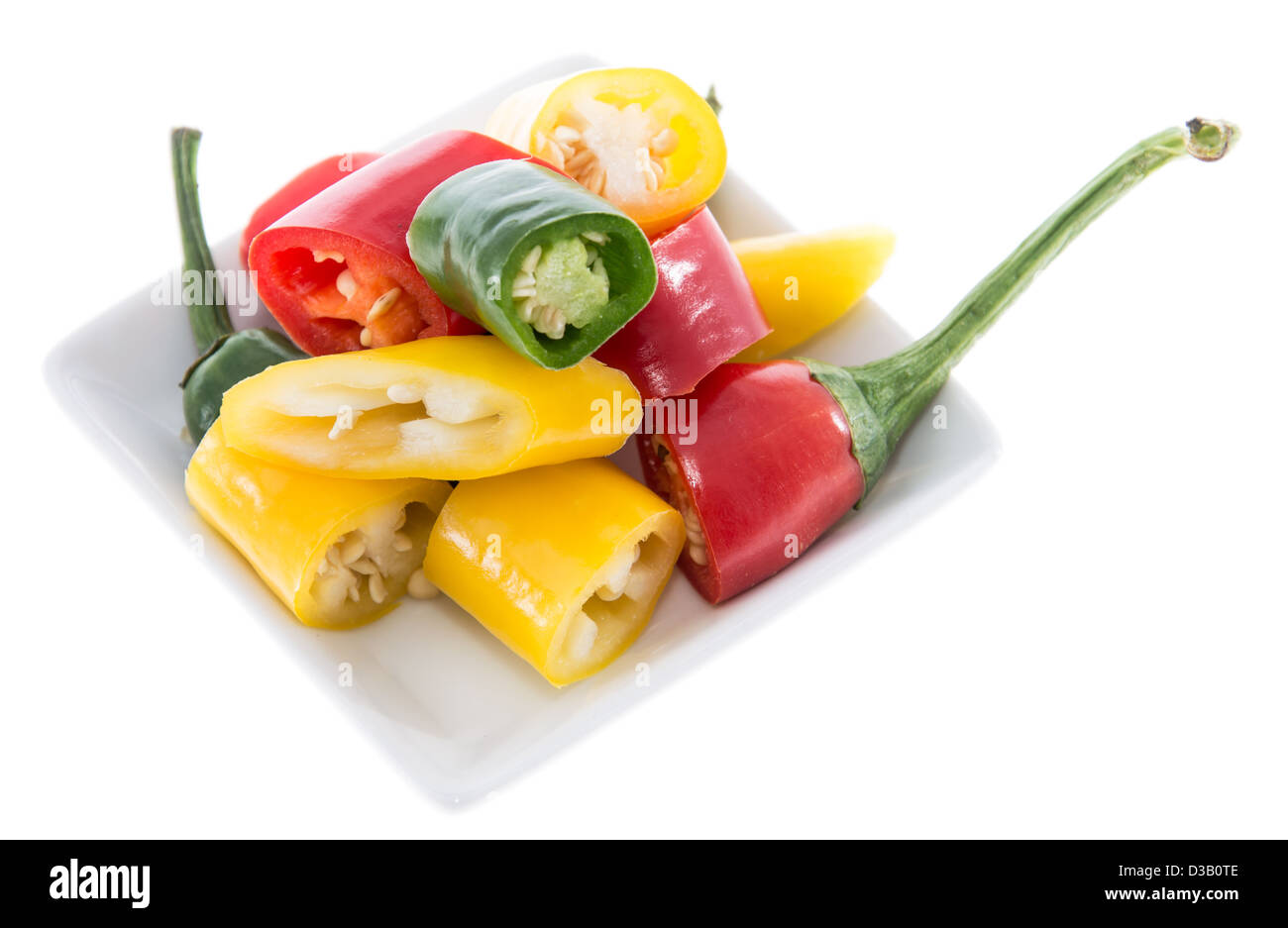 Chilli pieces isolated on white background Stock Photo - Alamy