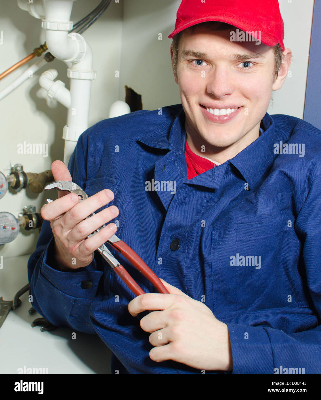 Plumber holding plastic pipe hi-res stock photography and images - Alamy