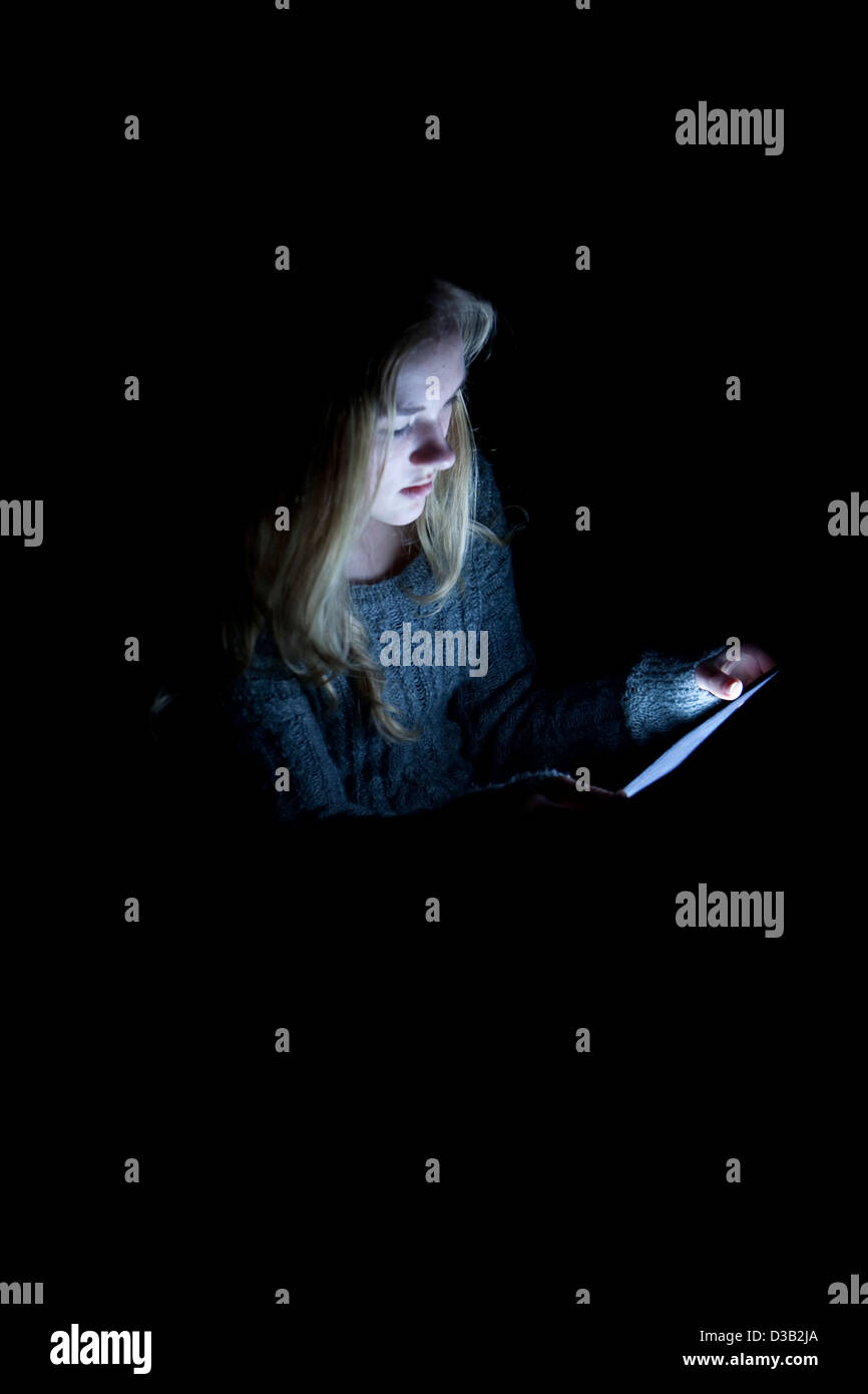 Girl in dark room hi-res stock photography and images - Alamy