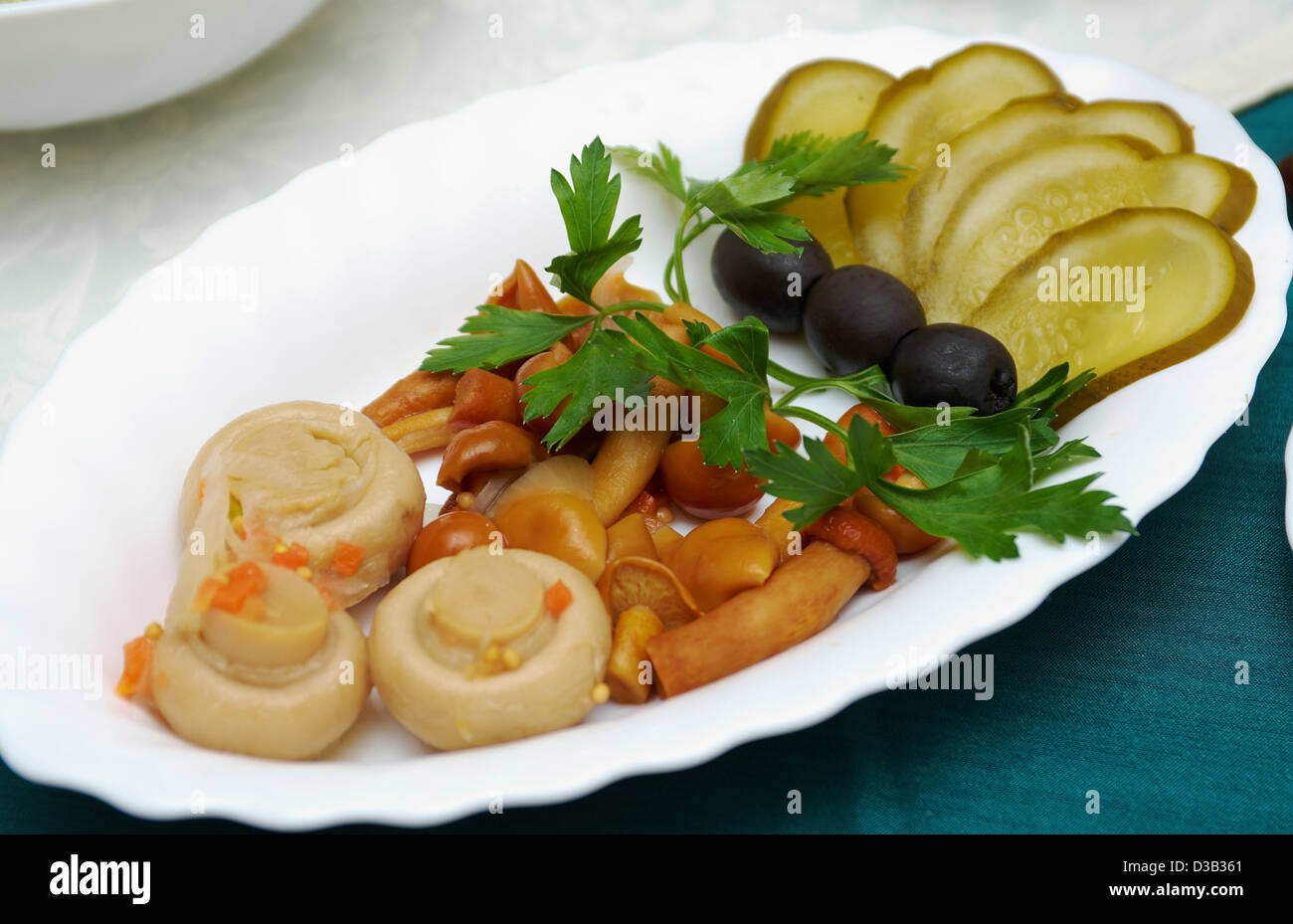 Snacks of vodka.mushrooms and marinated pickles Stock Photo - Alamy