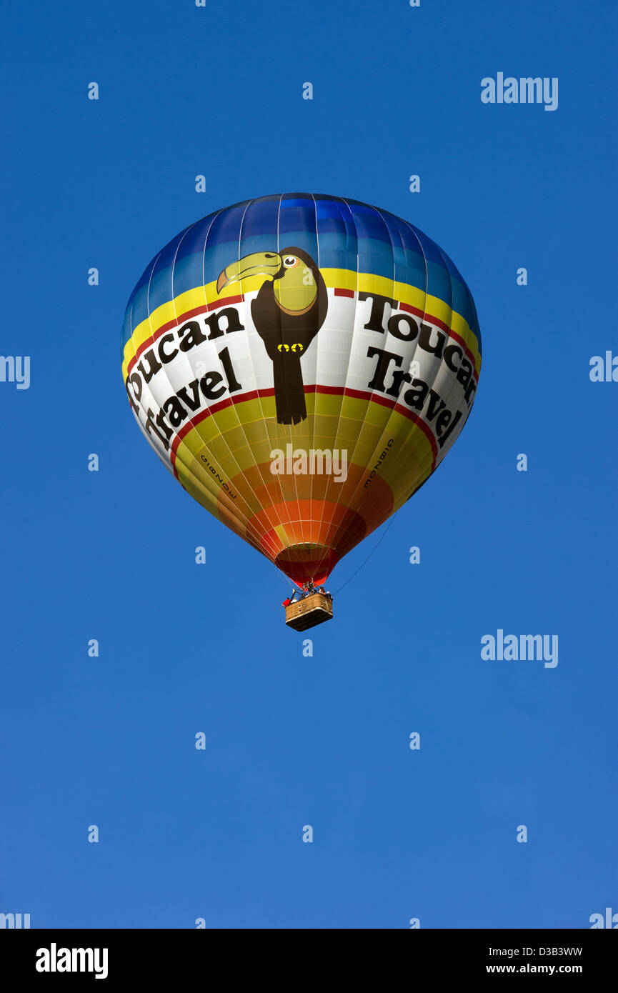 A hot air balloon flies over Hampshire in England Stock Photo - Alamy