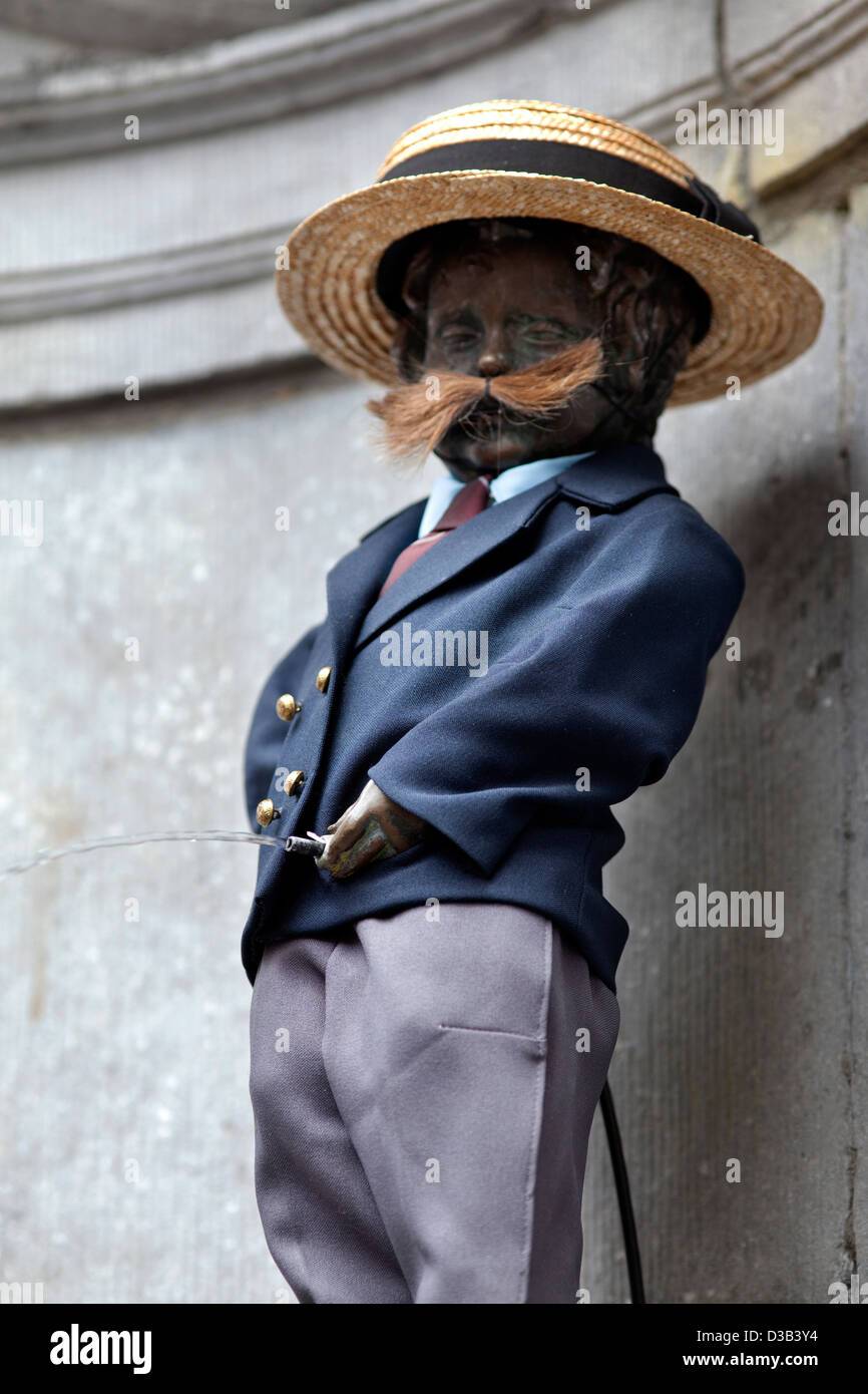 Brussels, Mannequin-Pis statue in Moustache club dress Stock Photo - Alamy