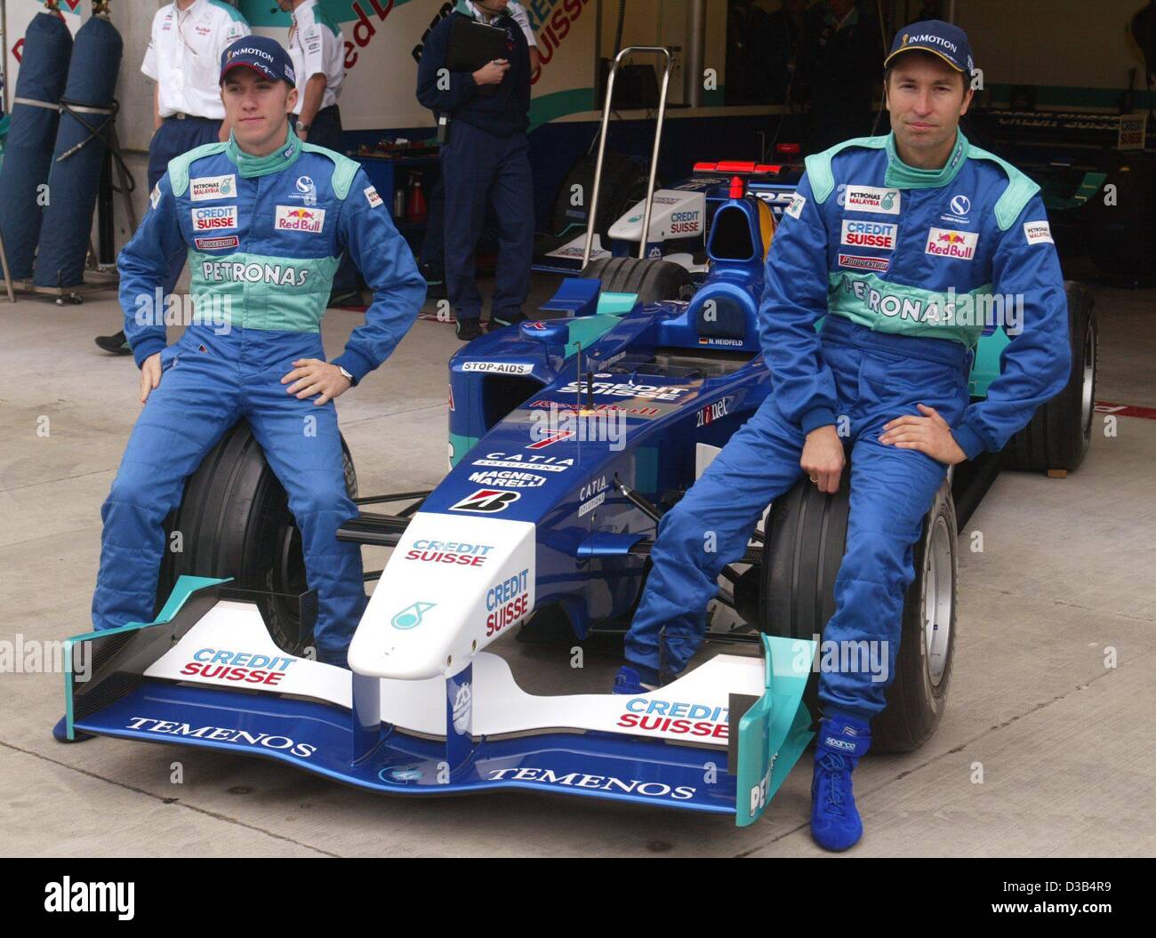 (dpa) - German formula 1 pilots Heinz-Harald Frentzen (R) and his ...
