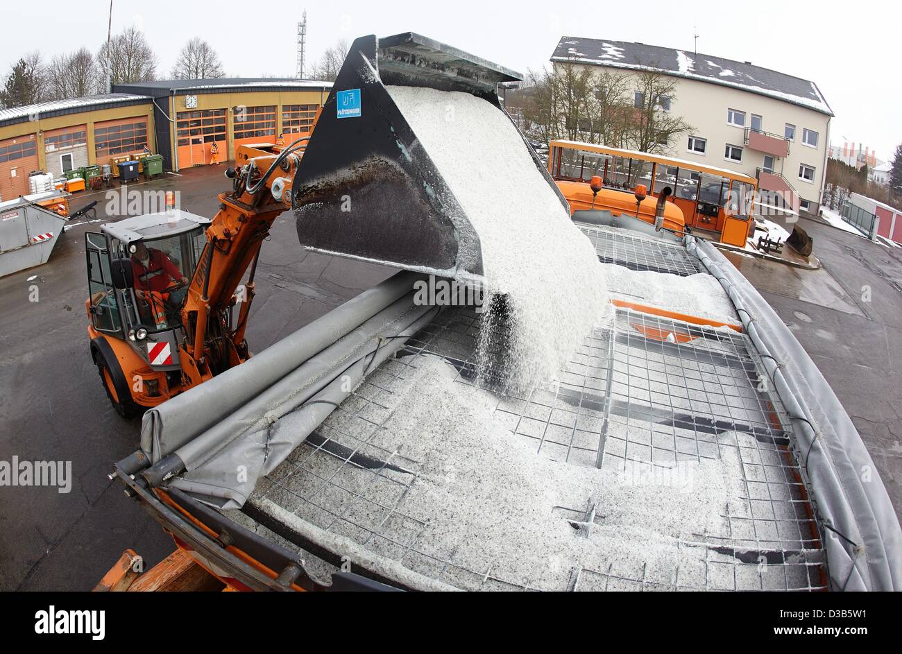 A salt truck is loaded at the road maintenance depot in Simmern ...