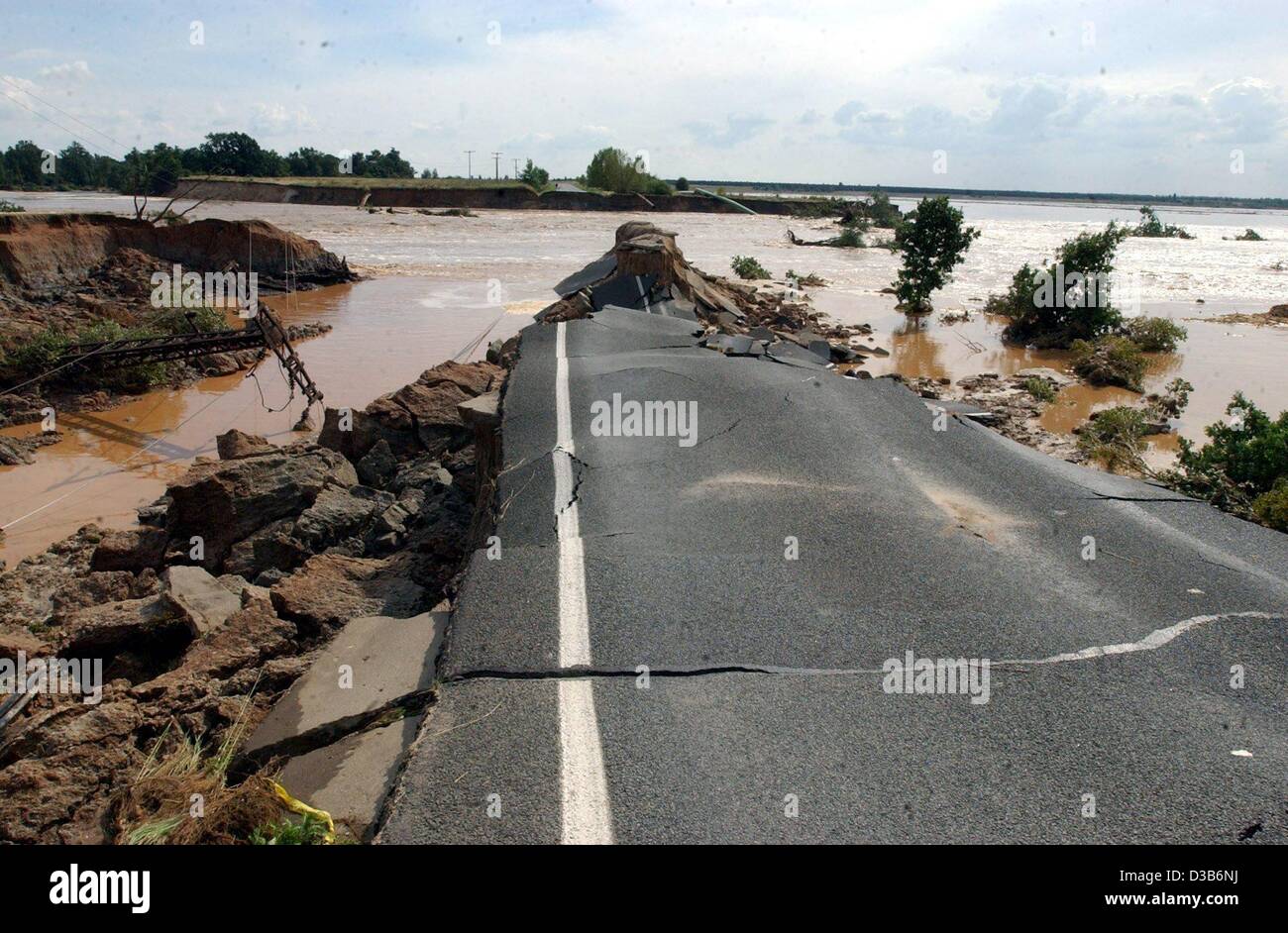 Disasters accidents dis flood muddy water street breach dyke soil ...