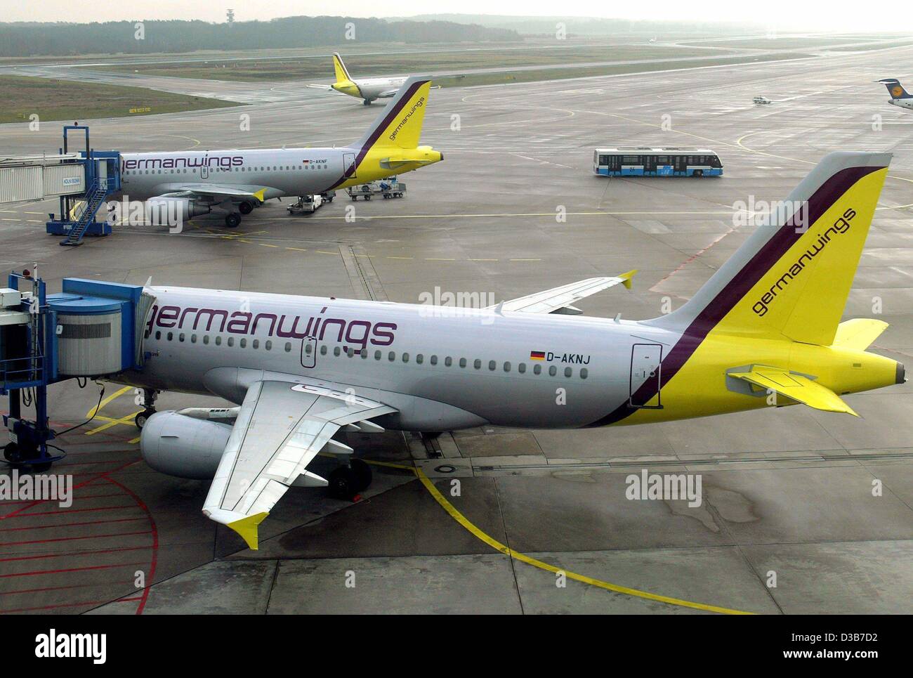 (dpa) - Aircrafts of the German budget airline Germanwings stand at the ...