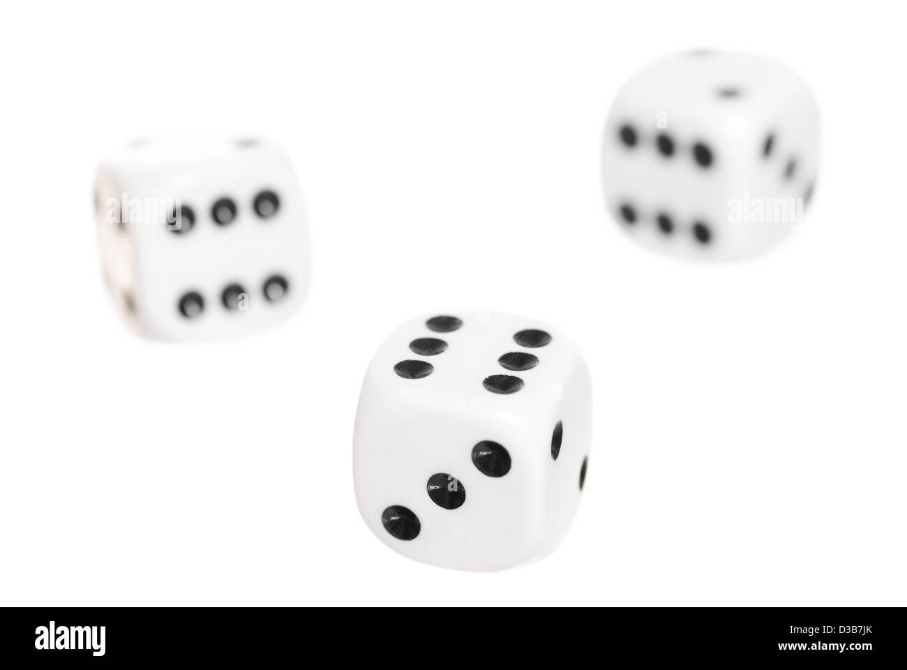 Three falling dice on white background Stock Photo - Alamy