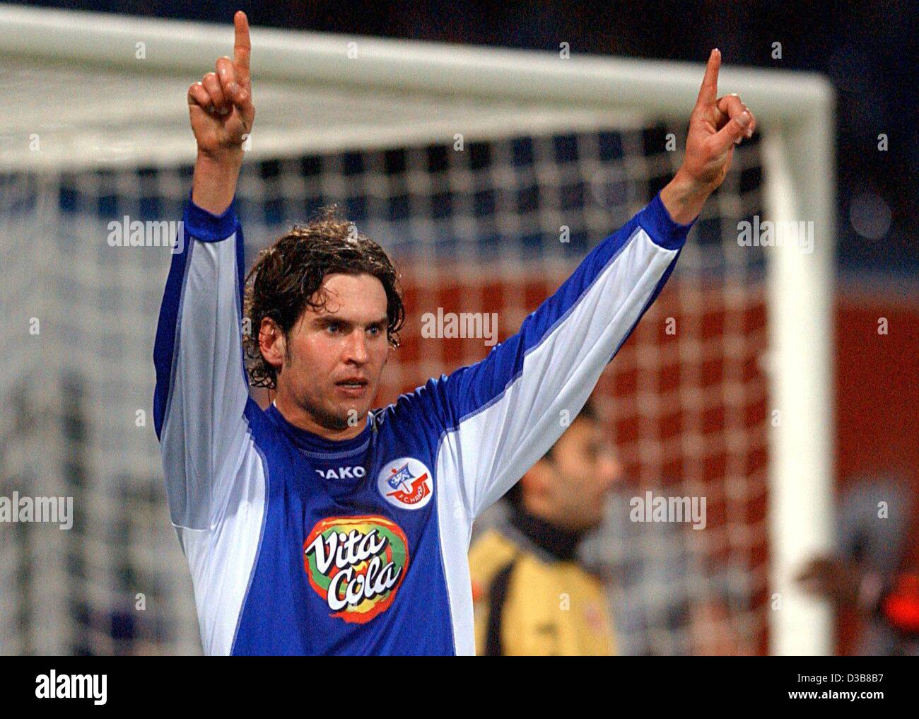 (dpa) - Rostock's midfielder Thomas Meggle jubilates after scoring a ...
