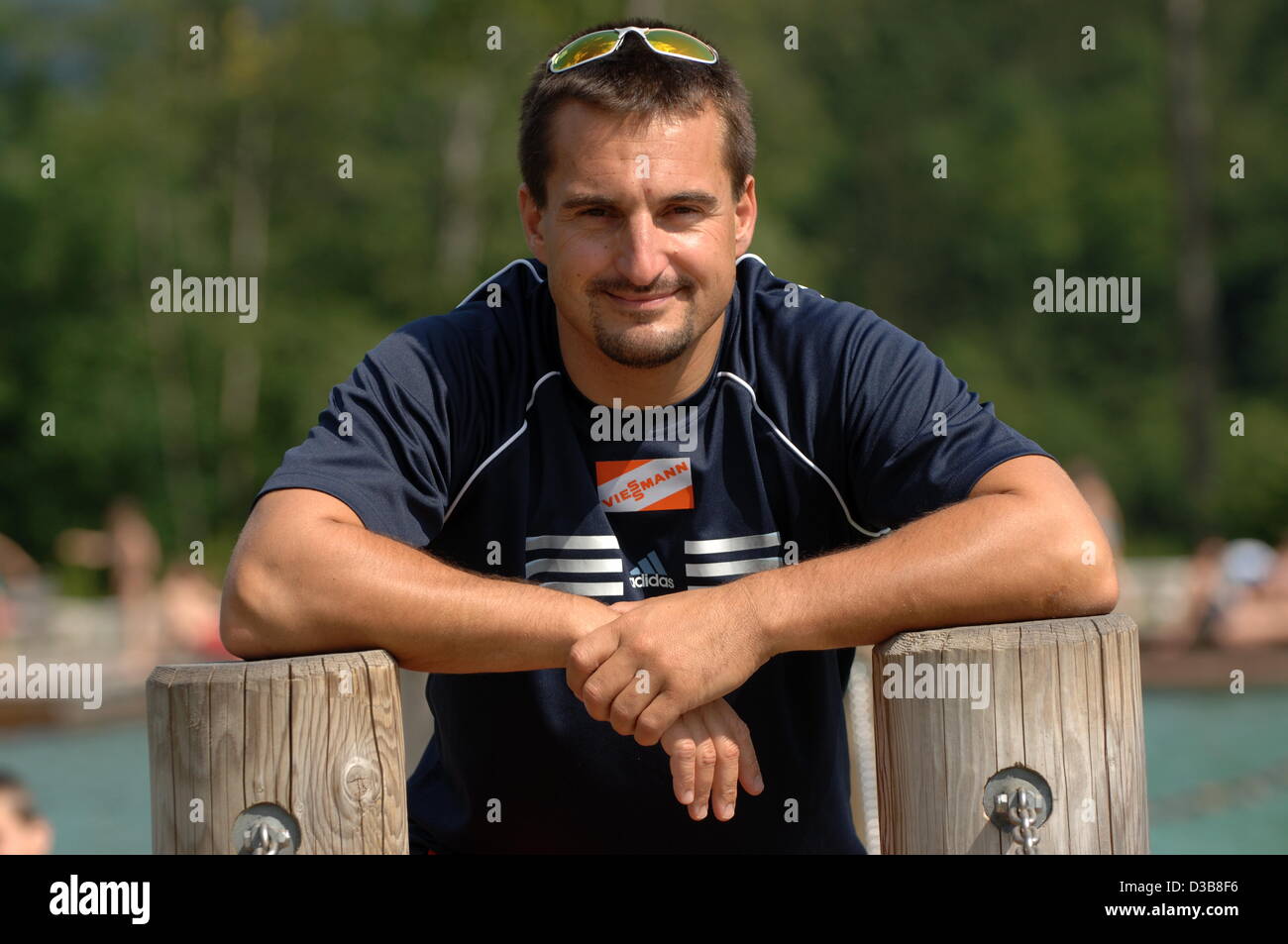 (dpa) - German luger pro Georg Hackl smiles for the journalists in ...