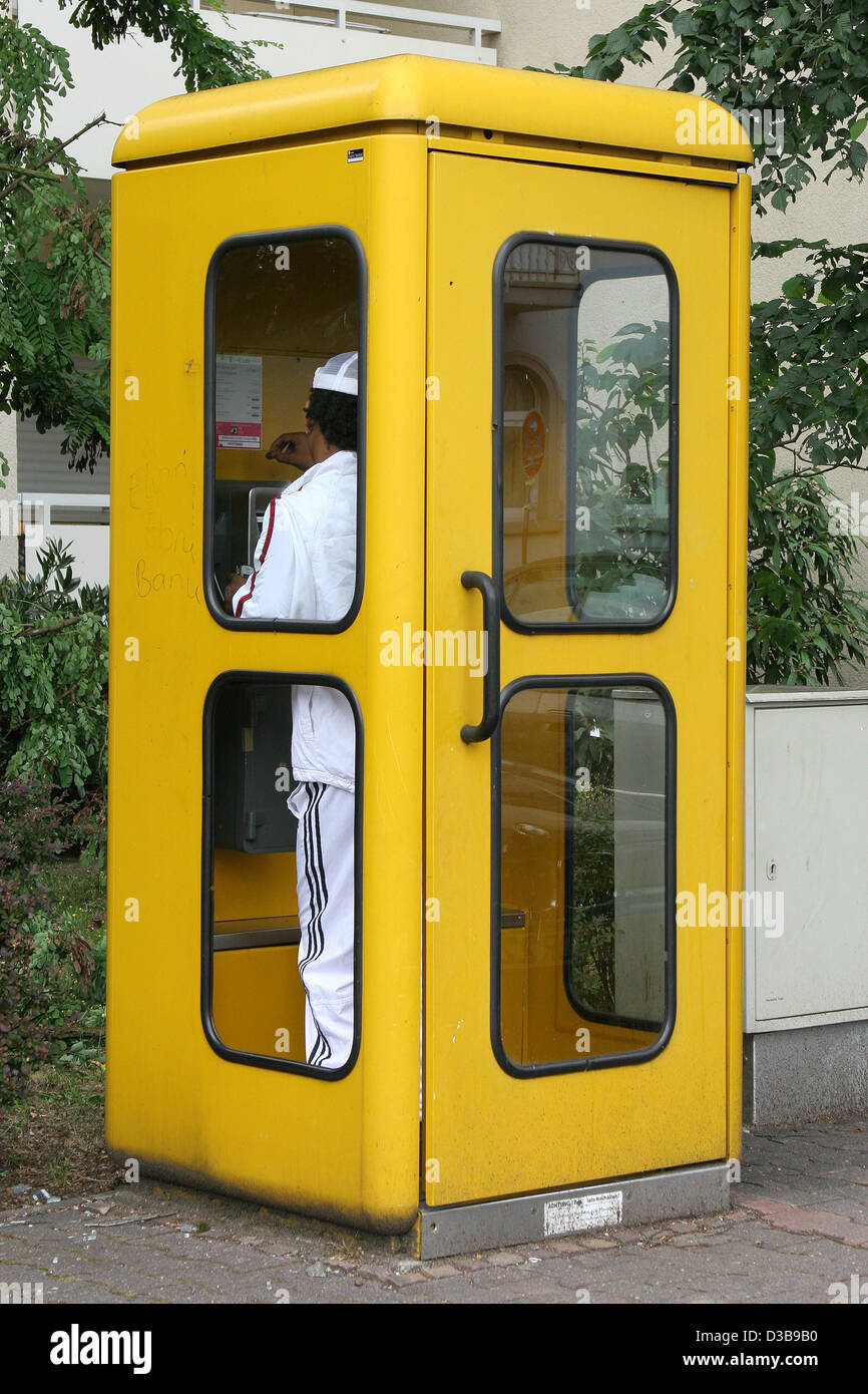 (dpa) - A yellow public telephone booth pictured in Frankfurt, Germany ...