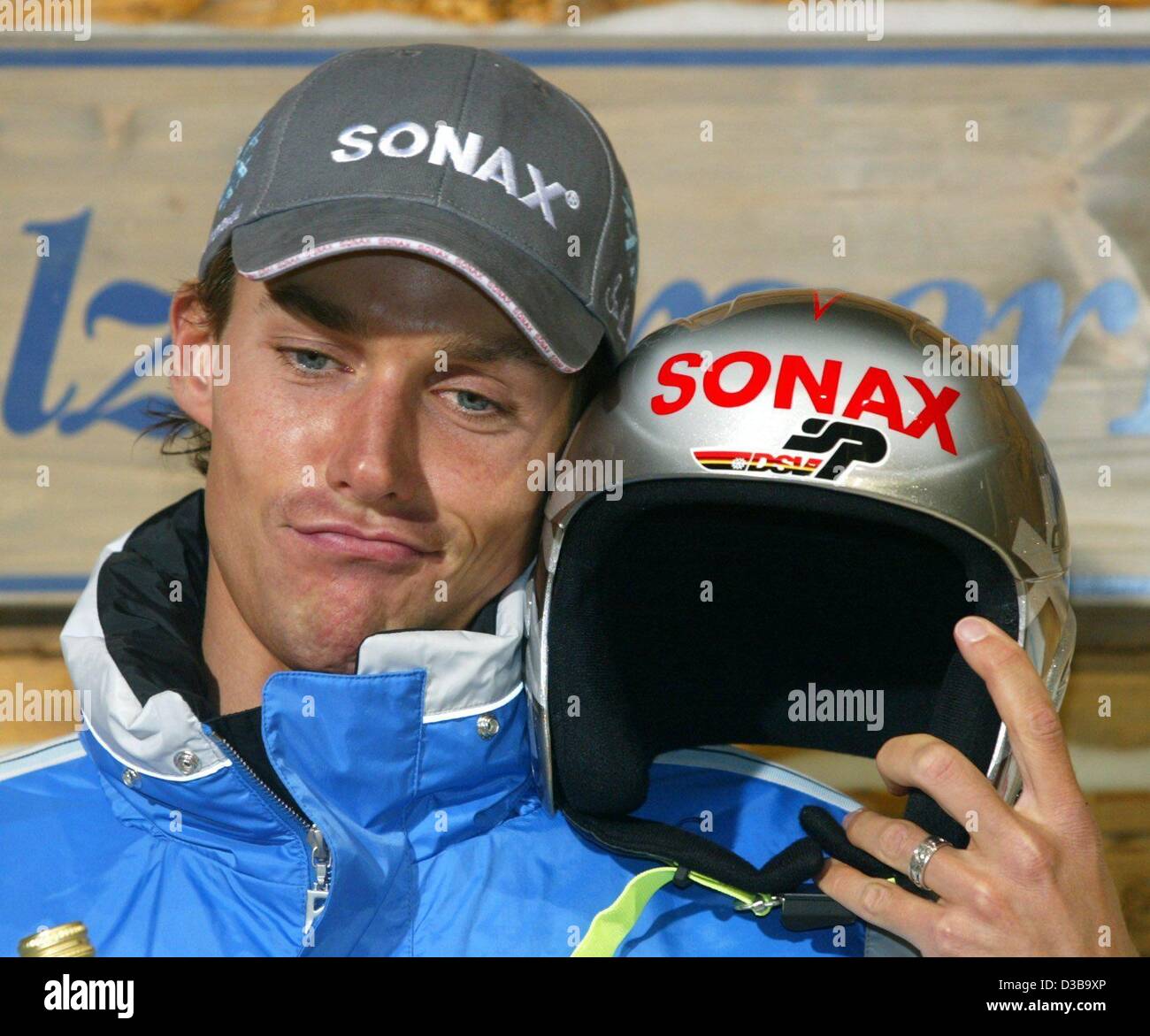 (dpa) - German ski jumper Sven Hannawald presents his new helmet during ...