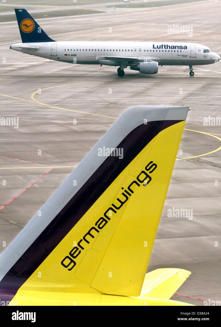 (dpa) - Aircrafts of the German budget airline Germanwings stand at the ...