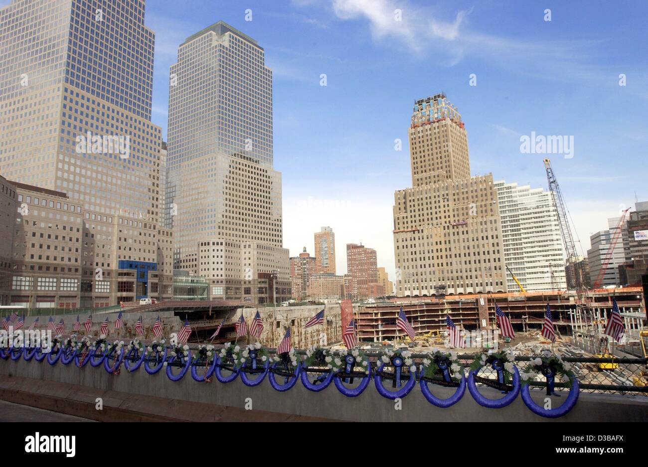 (dpa) - Flags and garland decorate the area around of Ground Zero in ...