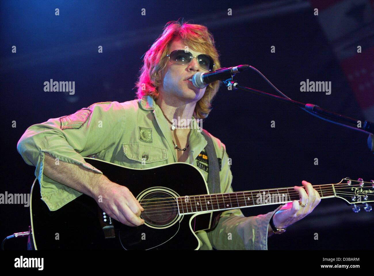 (dpa) - Rock star Jon Bon Jovi, pictured during a concert with his band ...