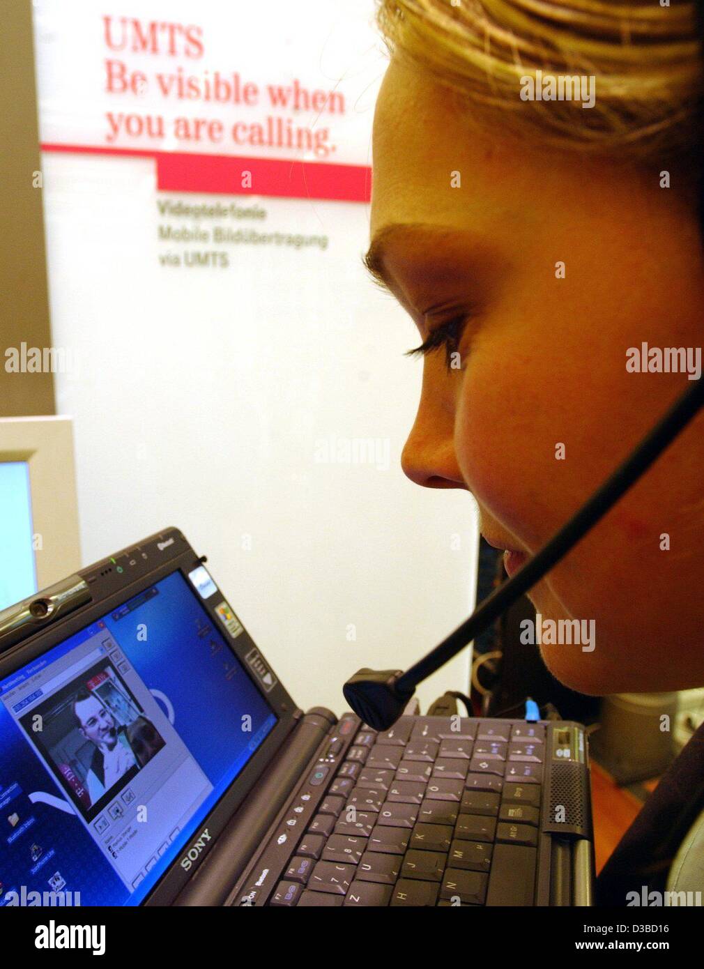 (dpa) - A Telekom employee shows how the video communicaton and ...