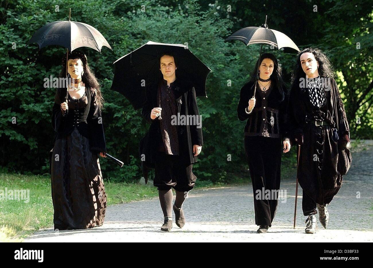 (dpa) - A group of goths walk through a park in the city centre of ...