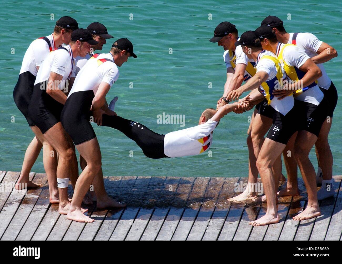 (dpa) - The German rowing team is about to throw their helmsman Peter ...