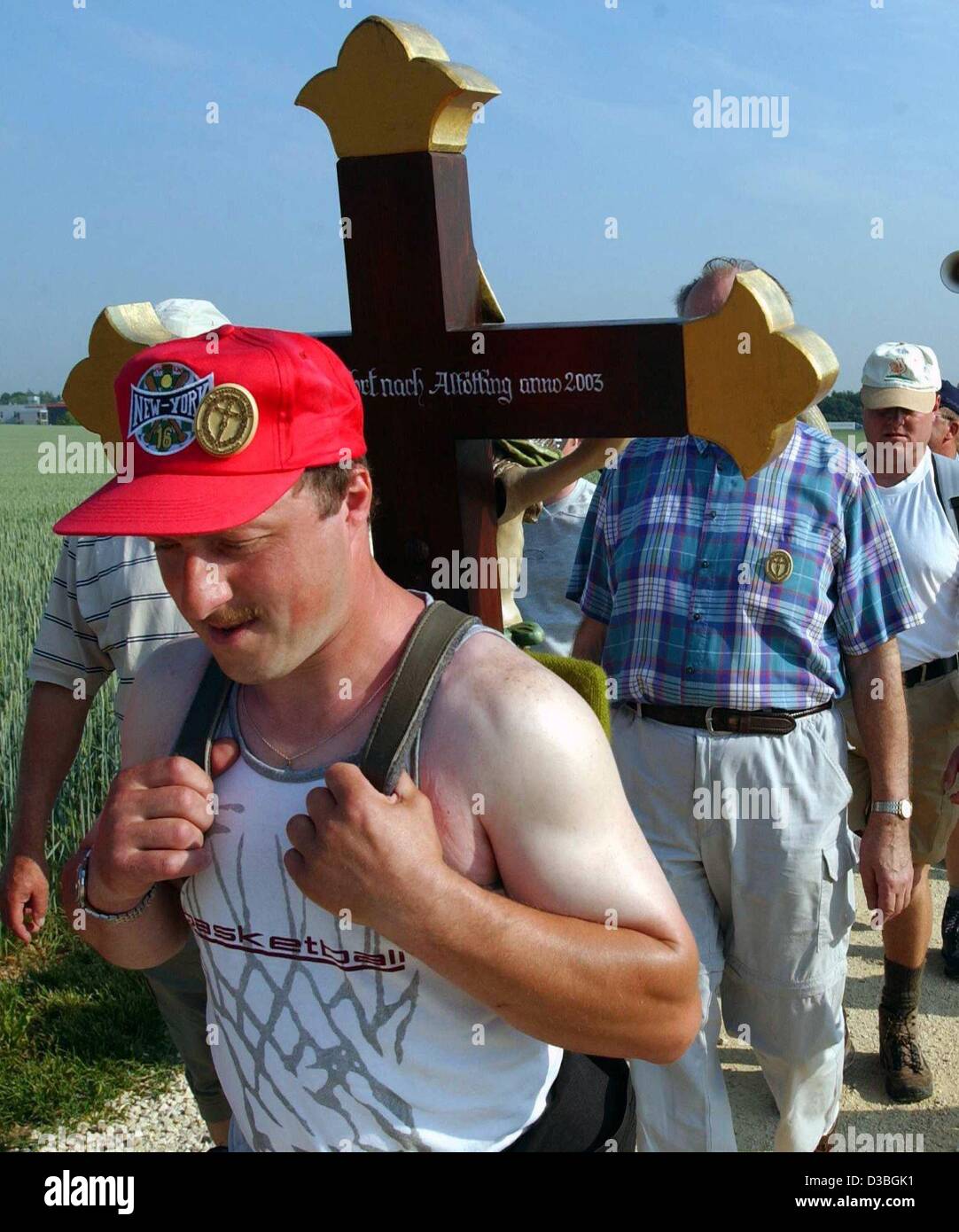 Carrying a cross on their back hi-res stock photography and images - Alamy