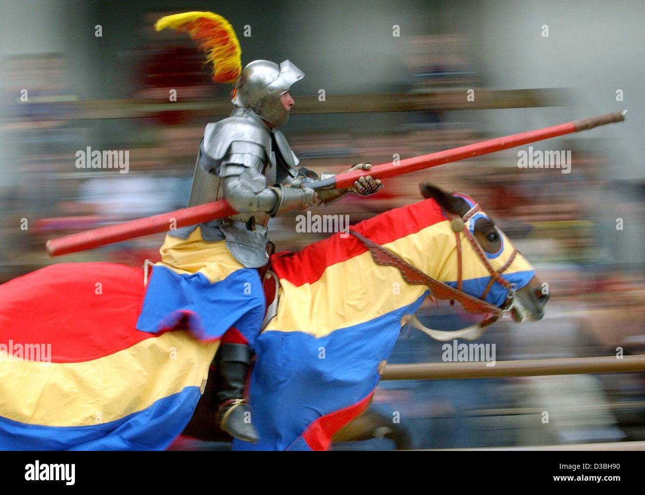 (dpa) - An armoured knight on his horse races towards his adversary ...