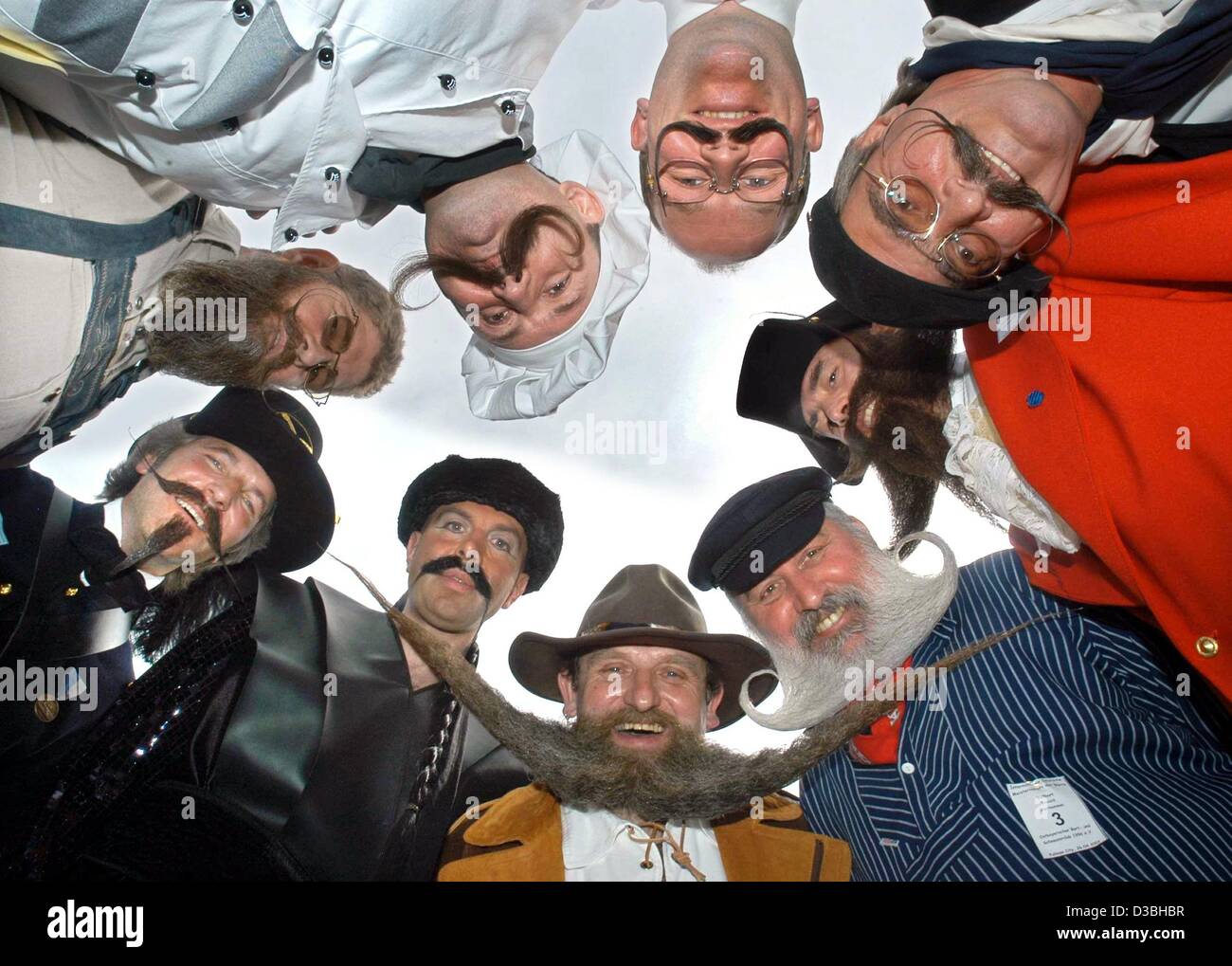 (dpa) - The members of a 'beard and moustache club' show their ...