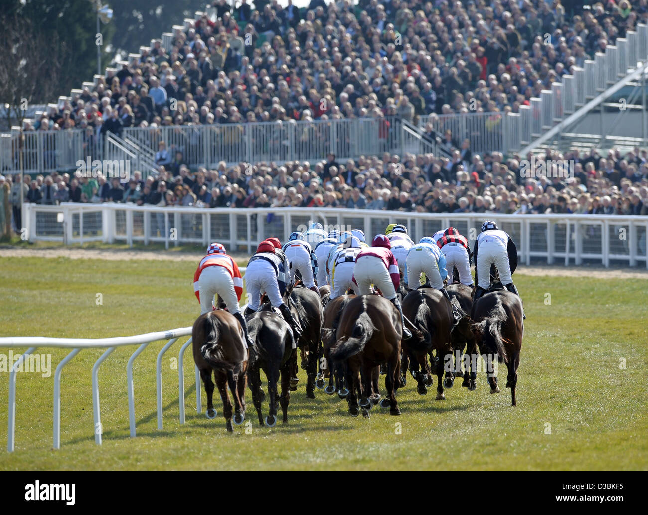 Jockeys ride their horse during The Cheltenham Festival an annual horse ...