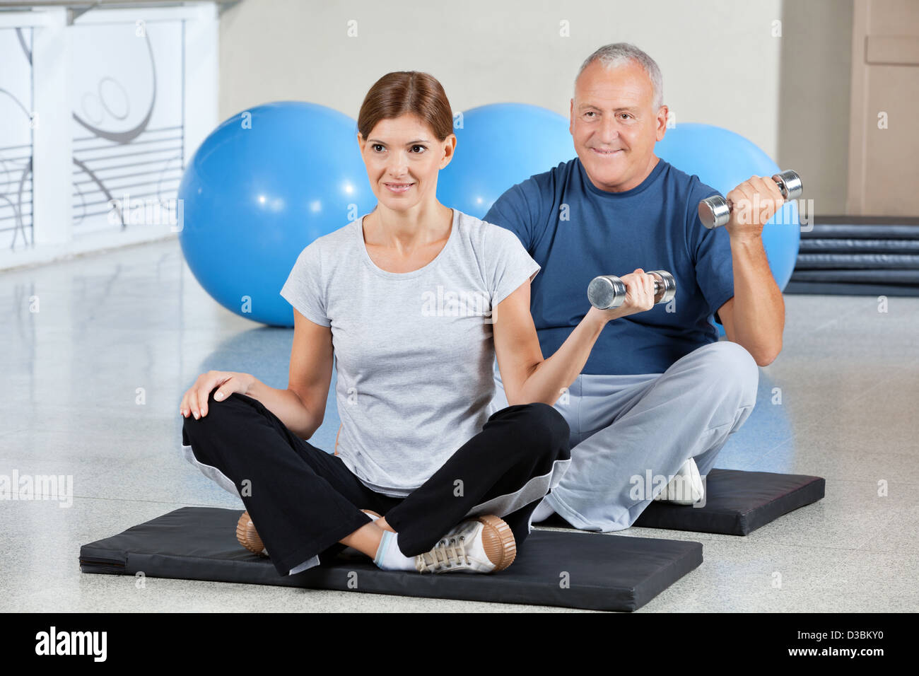 Fit person using dumbbells lift hi-res stock photography and images - Alamy