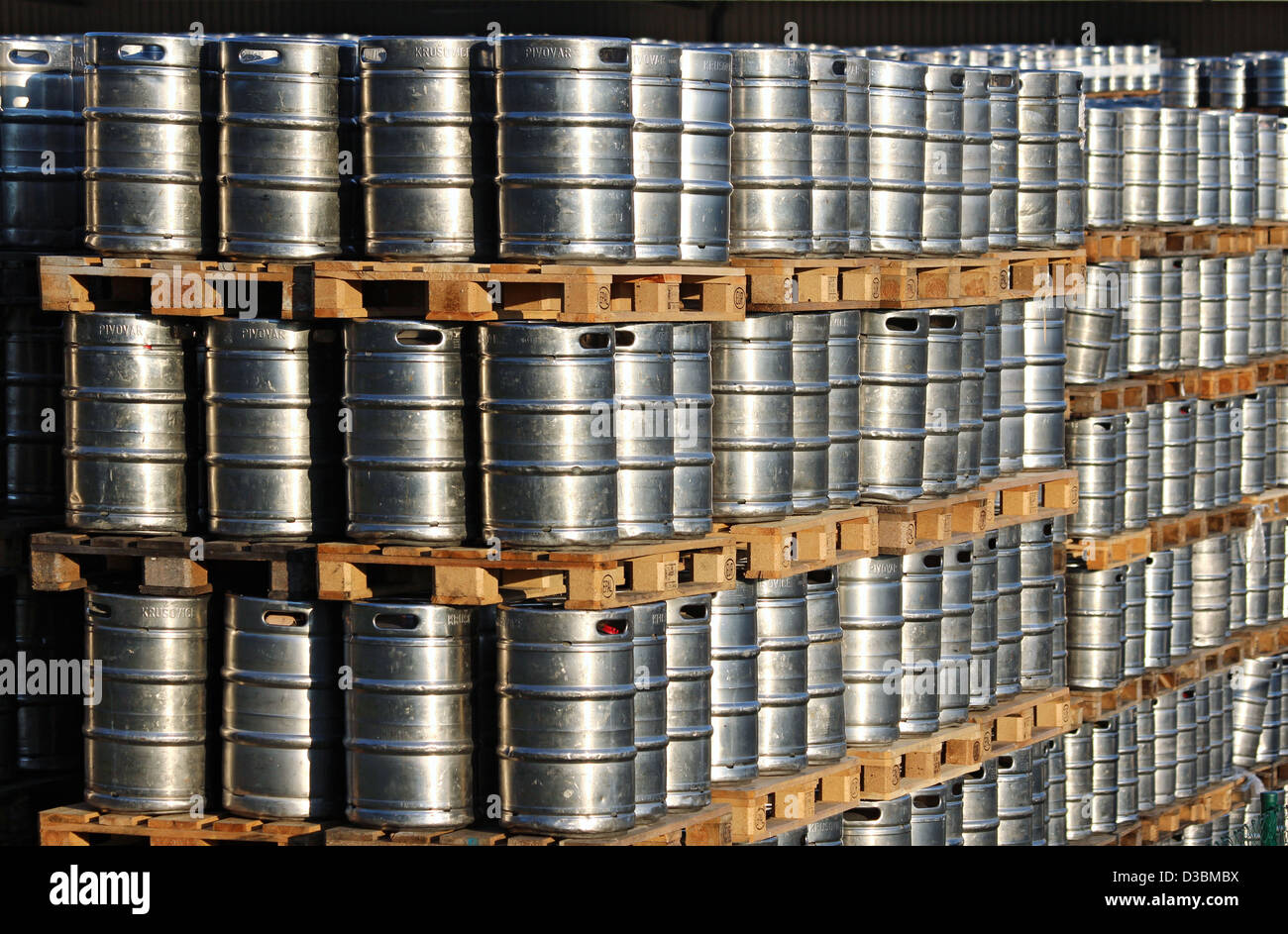 many steel kegs of beer in warehouse Stock Photo - Alamy