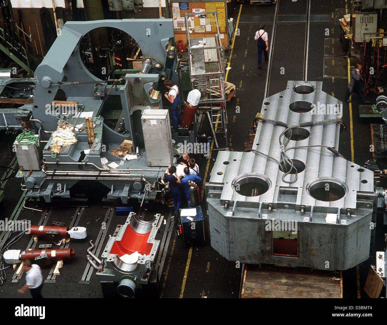 (dpa) - A view into the production hall where plant components for the ...