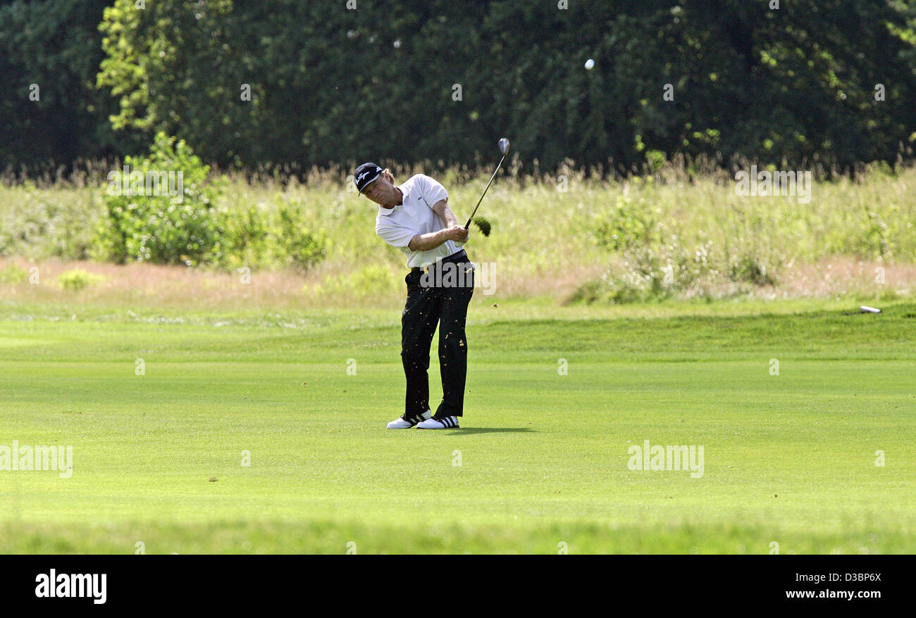 German golf player Bernhard Langer hits the ball in the 'Deutsche Bank ...