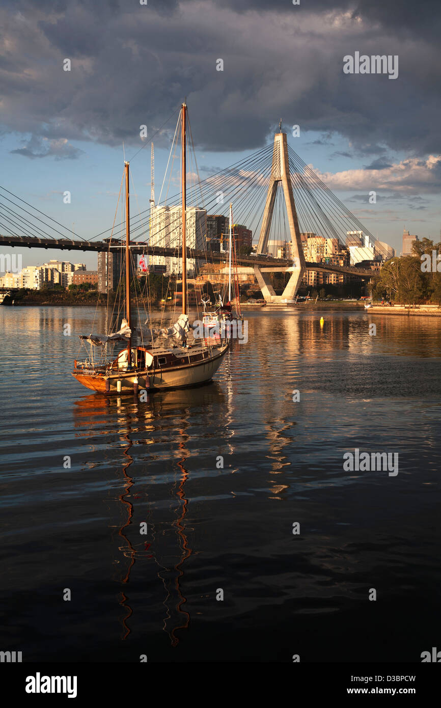 Yachts moored at sunset Blackwattle Bay ANZAC Bridge from Glebe Sydney ...