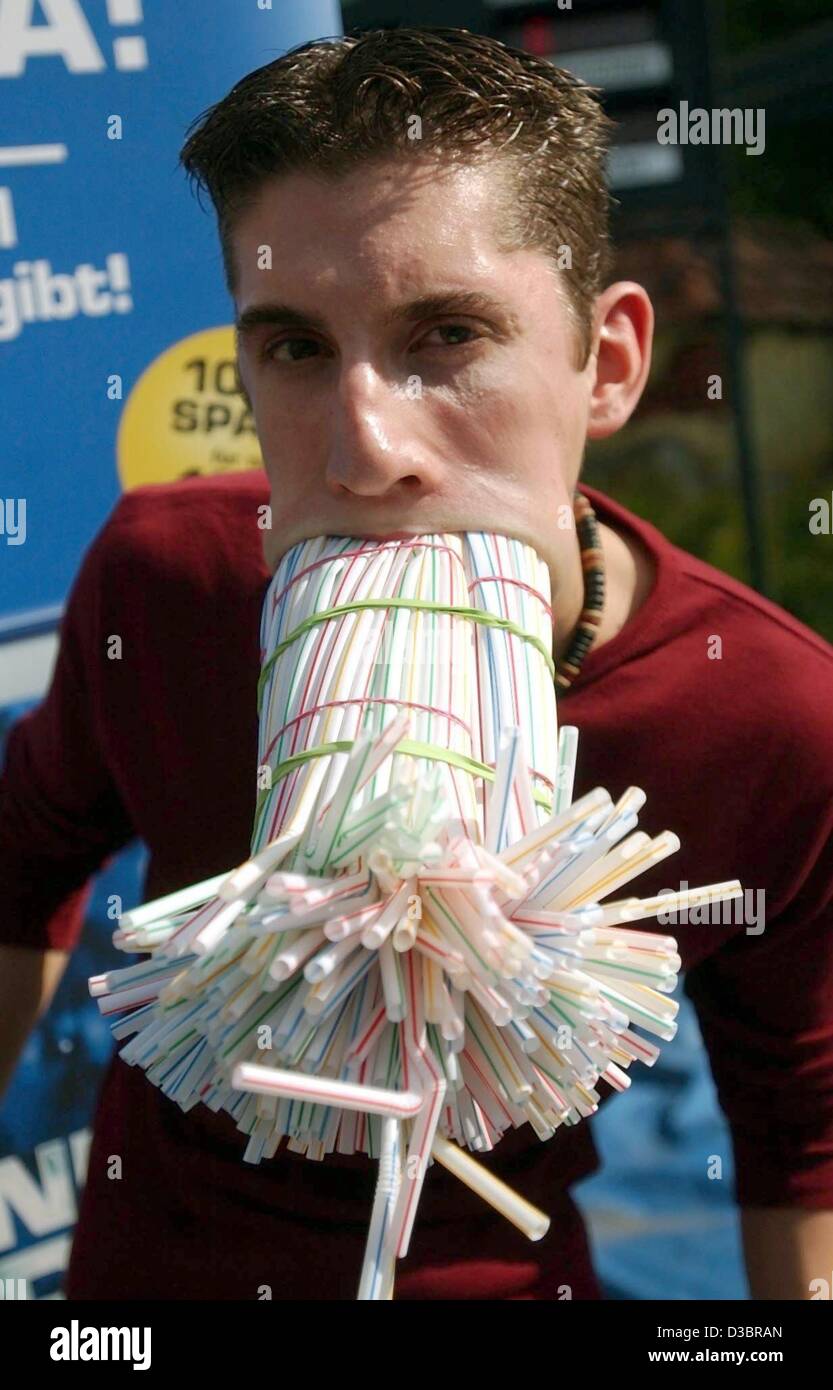 Straw In Mouth High Resolution Stock Photography and Images - Alamy