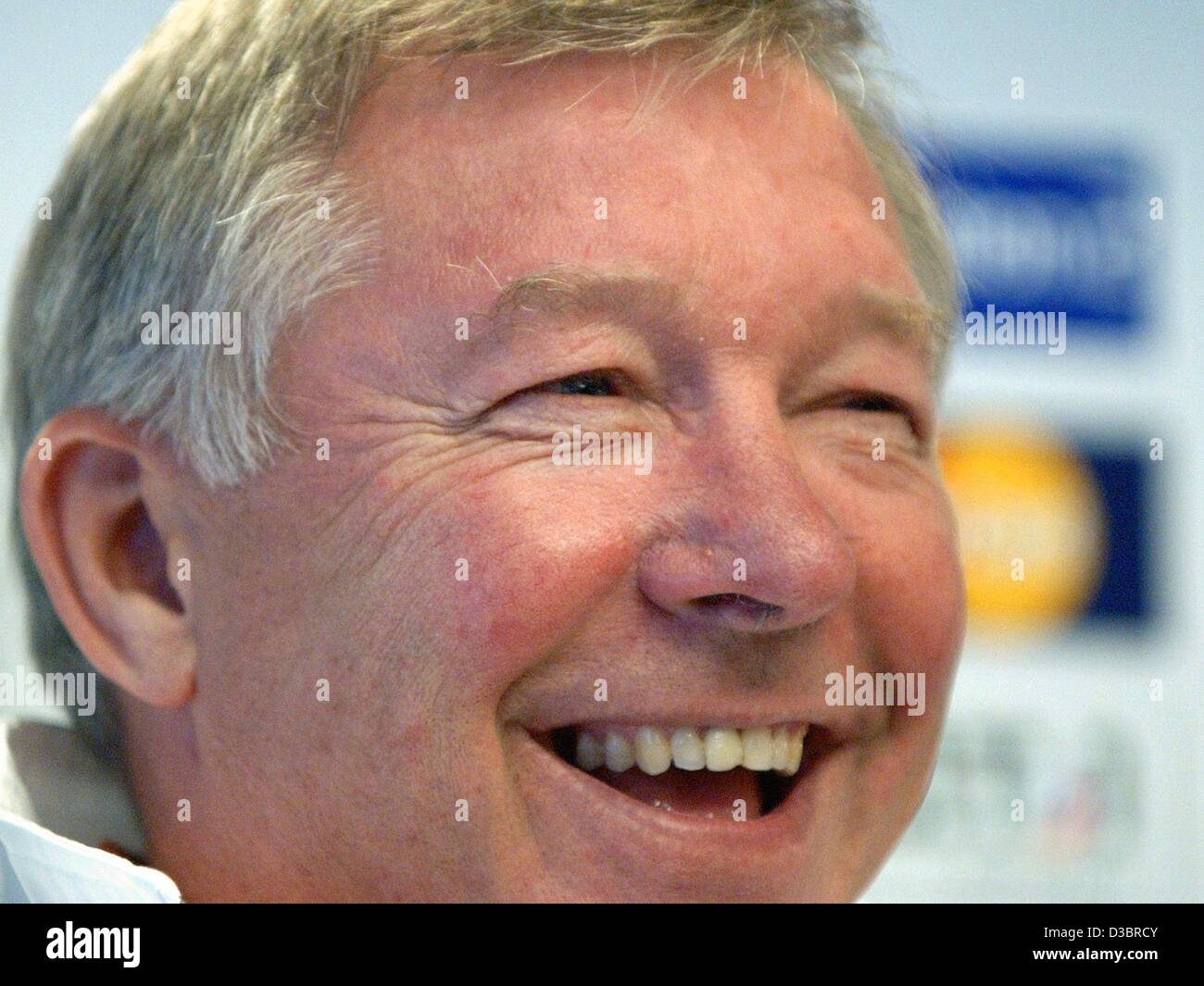 (dpa) - Manchester United's soccer coach Sir Alex Ferguson smiles ...
