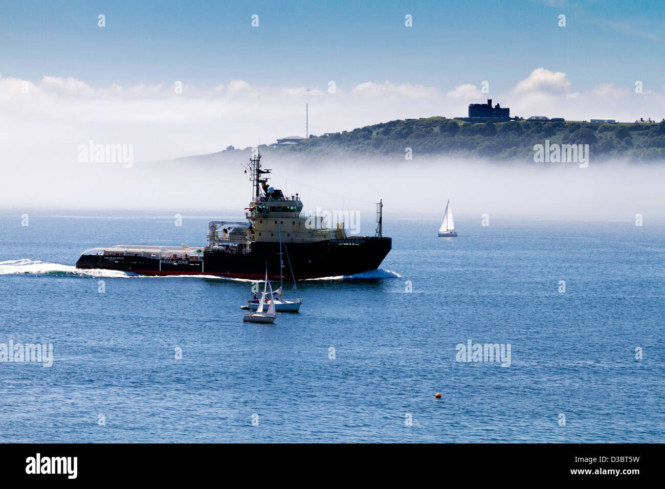 The Anglian Sovereign enters Carrick Roads with a fog bank building on ...