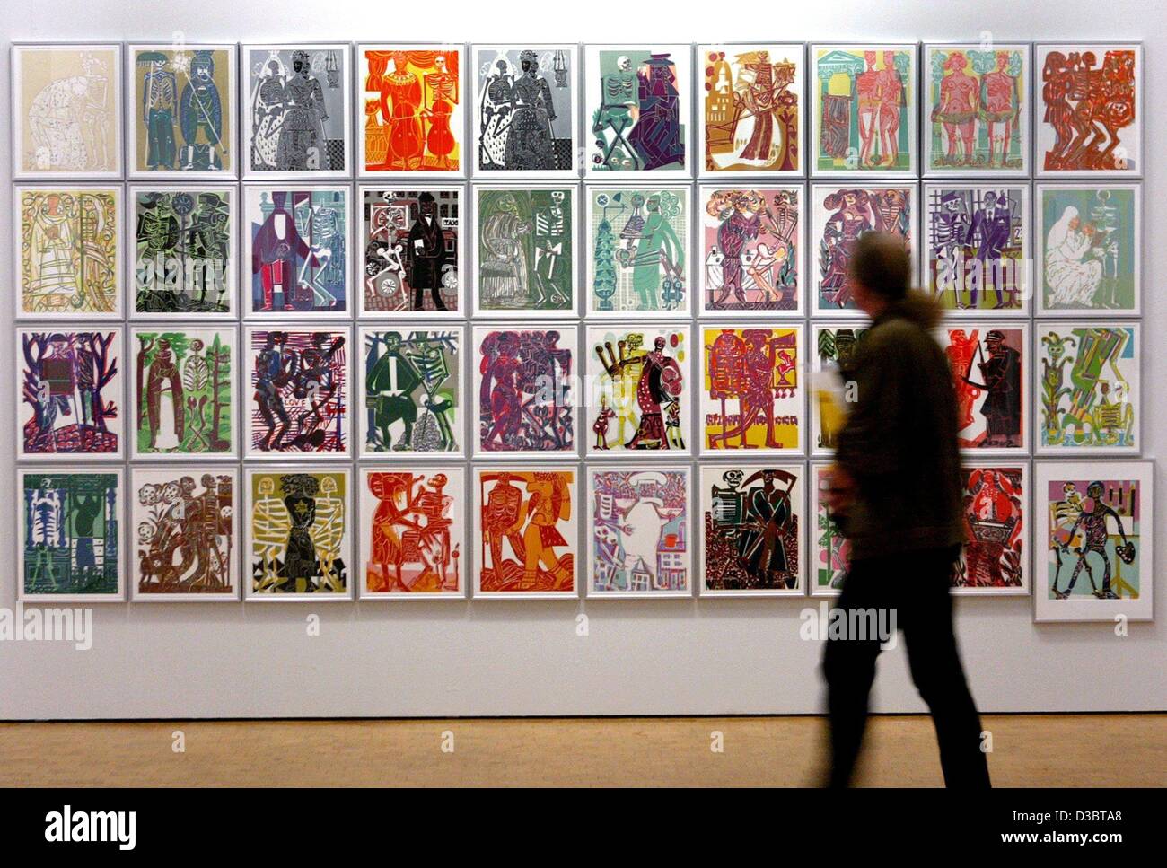 (dpa) - A person looks at the artwork 'Totentanz von Basel' (death ...
