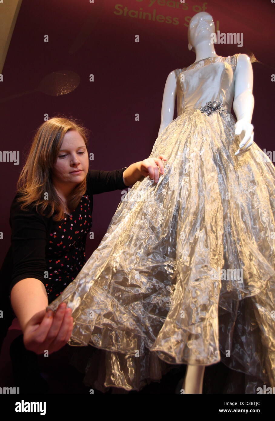 Lucy Cooper, Curator of Metalwork at Museums Sheffield prepares a ...