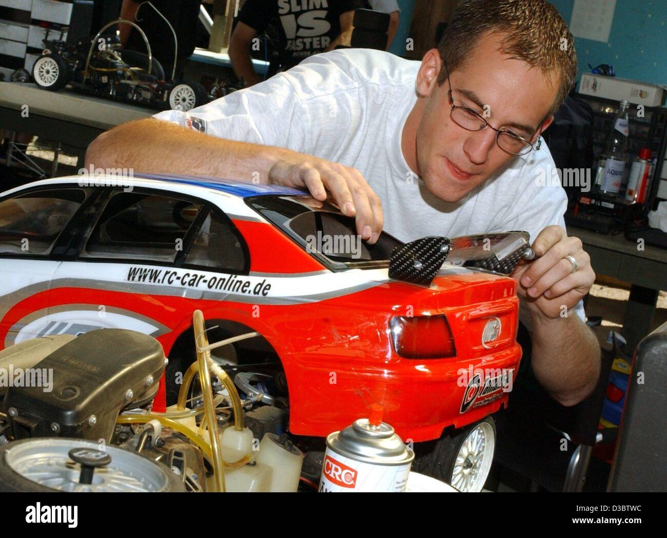 (dpa) - World champion Marcel Strauch prepares his model toruing car ...