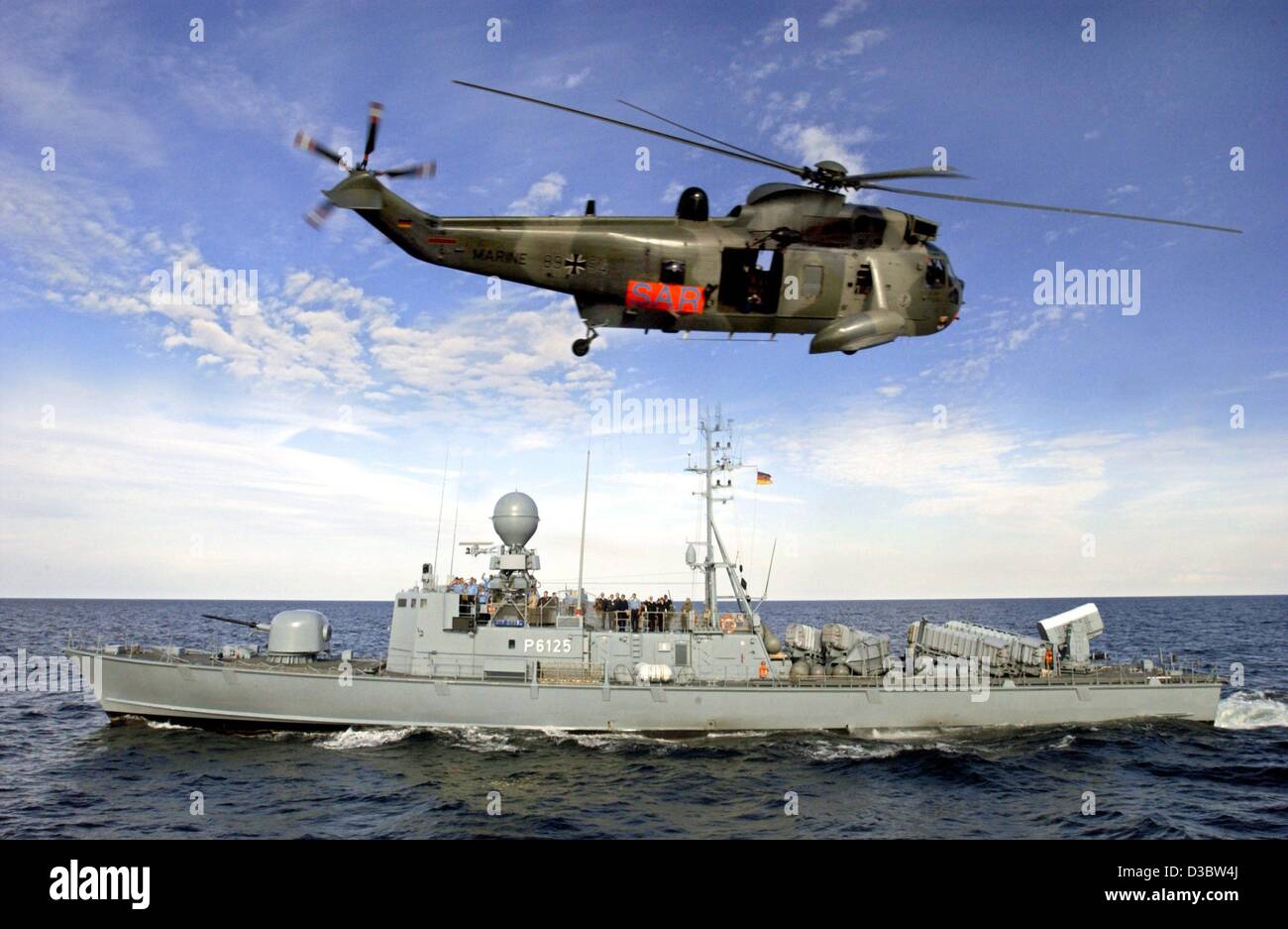 (dpa) - A SAR rescue helicopter for distress at sea flies over the ...