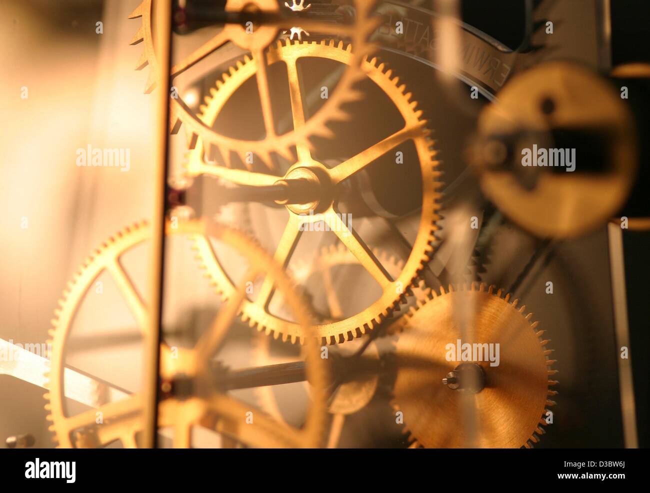 (dpa) - The close-up shows the cogwheels of a clockwork at the clock ...