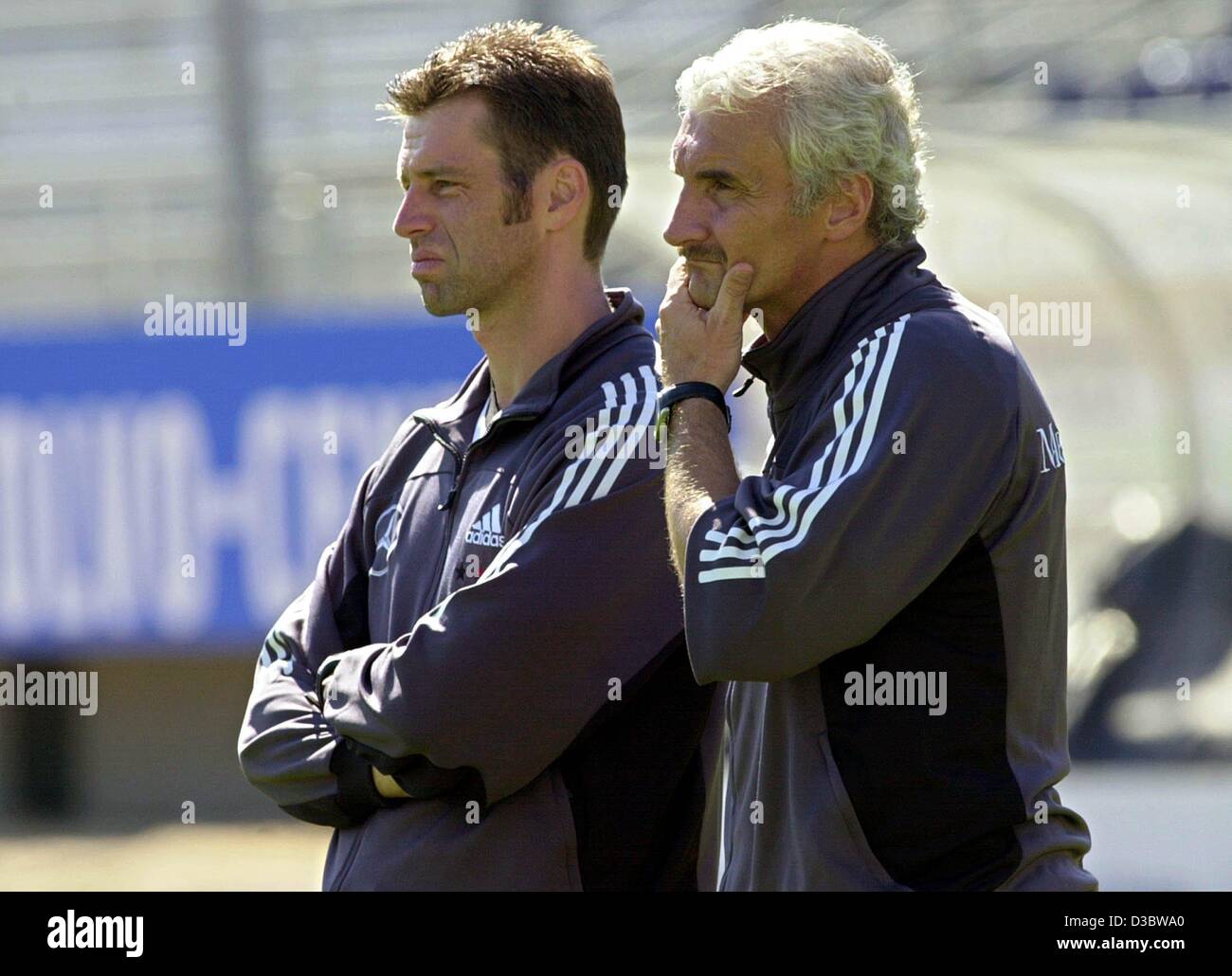 (dpa) - German national soccer coach Rudi Voeller (R) and trainer ...