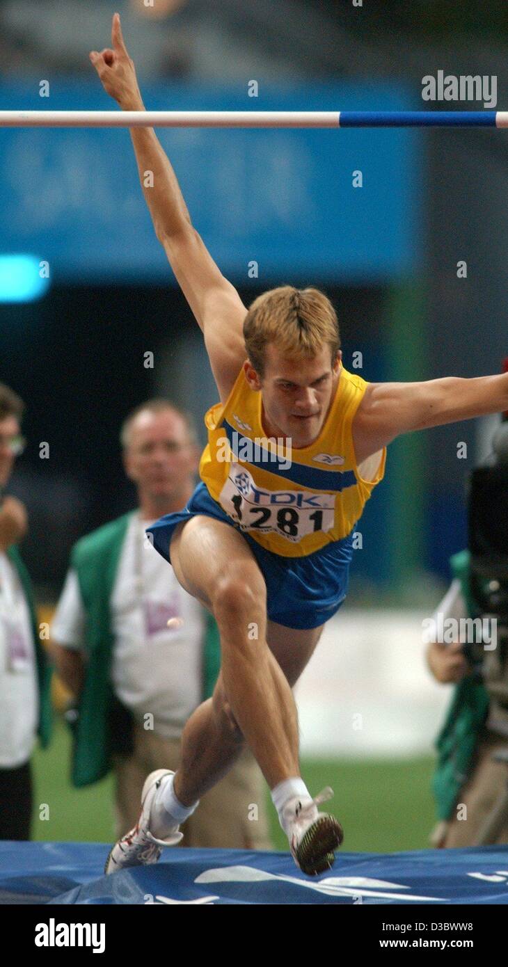 (dpa) - Swedish high jumper Stefan Holm gets up after clearing the bar ...