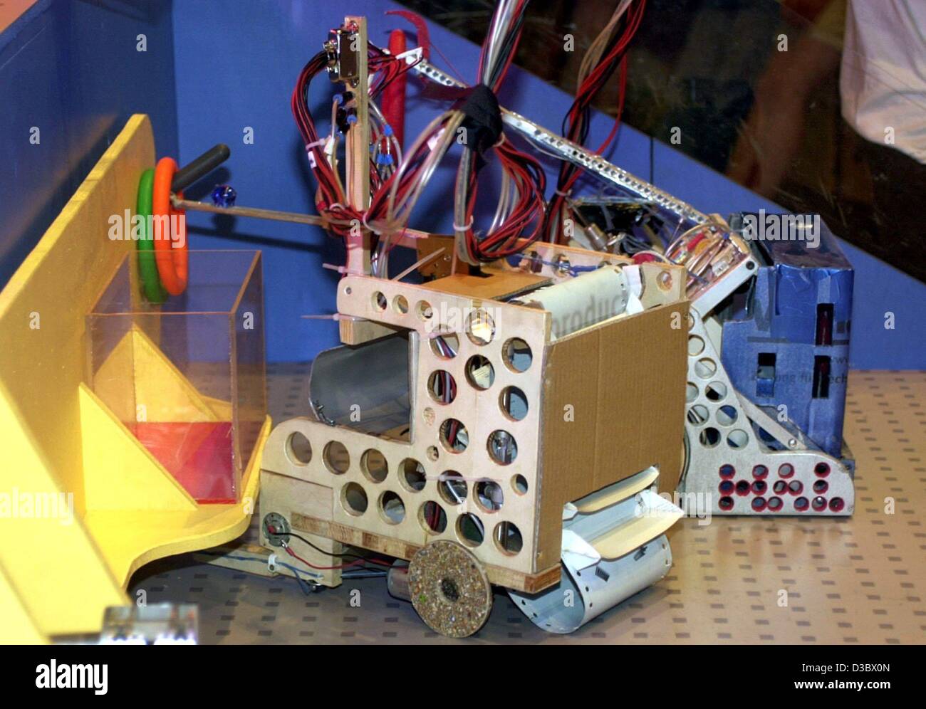(dpa) - The robot Pig-Lifter (front), constructed by the students ...