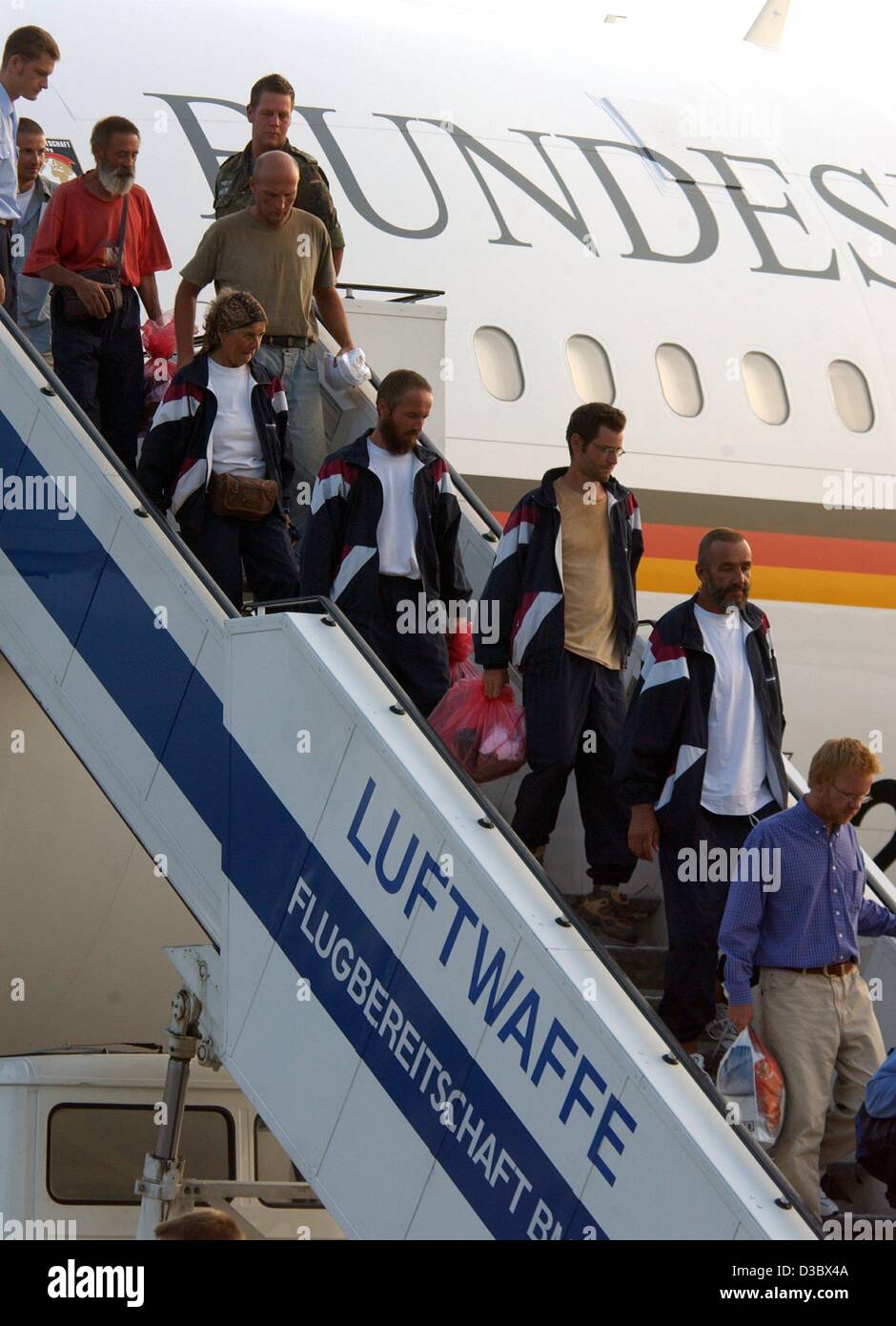 (dpa) - The released Sahara hostages (from top:) Frank Gottloeber, Kurt ...