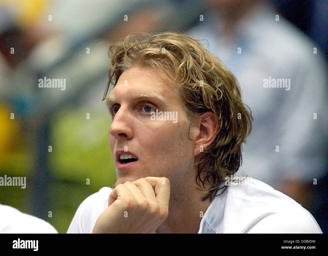 (dpa) - German national basketball player Dirk Nowitzki watches his ...